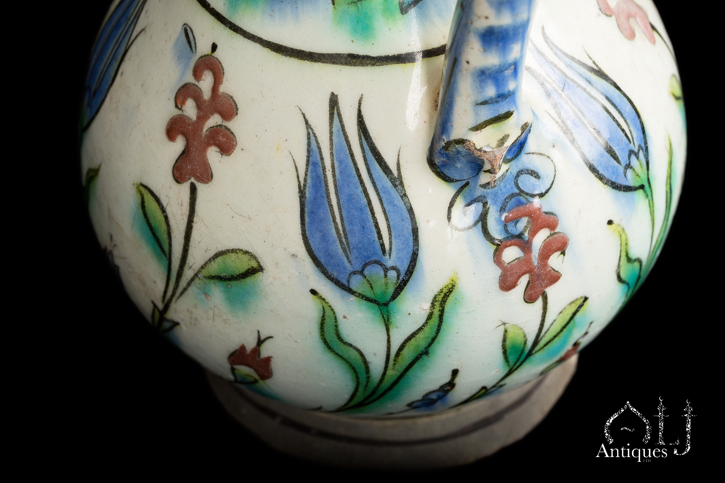 Iznik Ceramics, An Iznik Underglaze Polychrome Painted Pottery Jug ...
