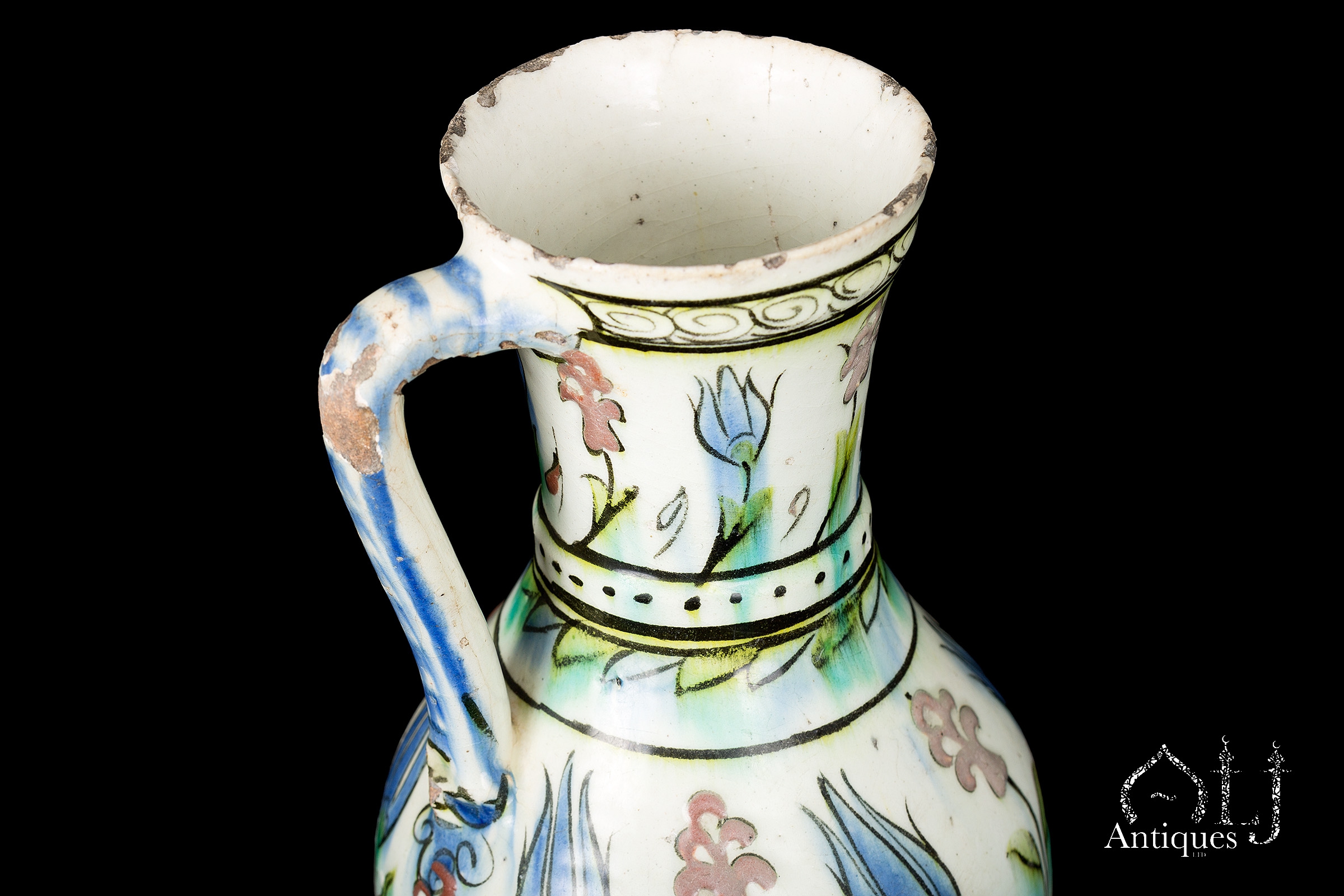 Iznik Ceramics, An Iznik Underglaze Polychrome Painted Pottery Jug ...